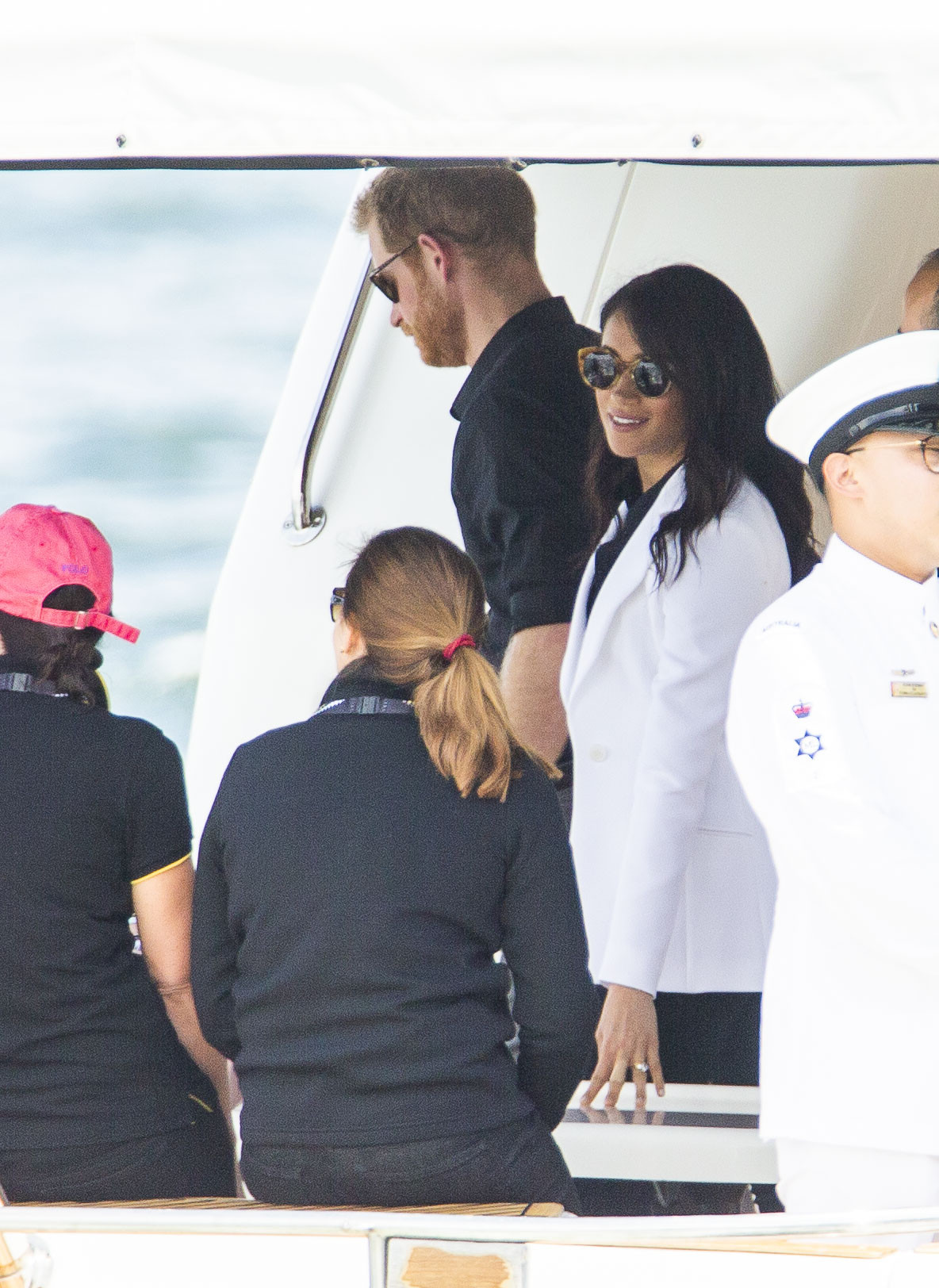 Casual Meghan Markle waves aboard boat in Sydney Harbour with Prince ...