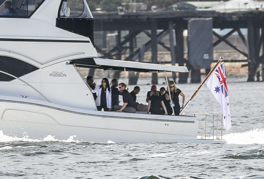 Casual Meghan Markle waves aboard boat in Sydney Harbour with Prince ...